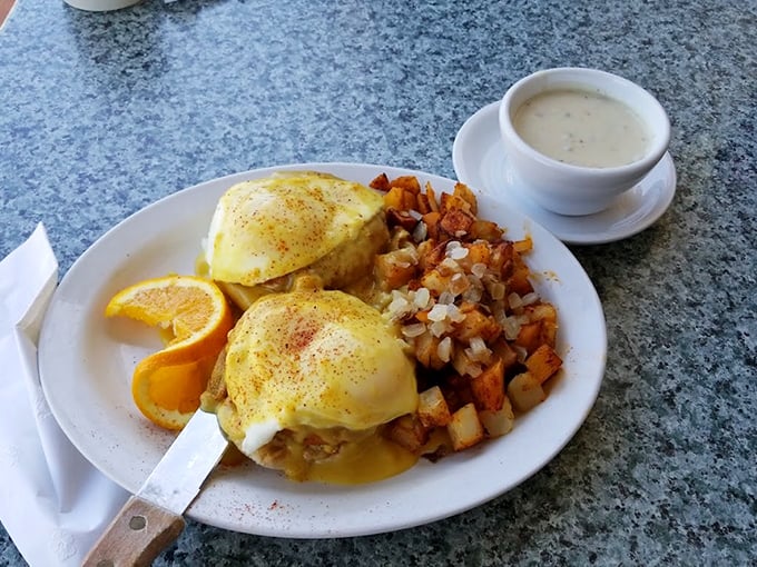 Eggs Benedict that would make a French chef weep with joy, paired with home fries that could start their own fan club.