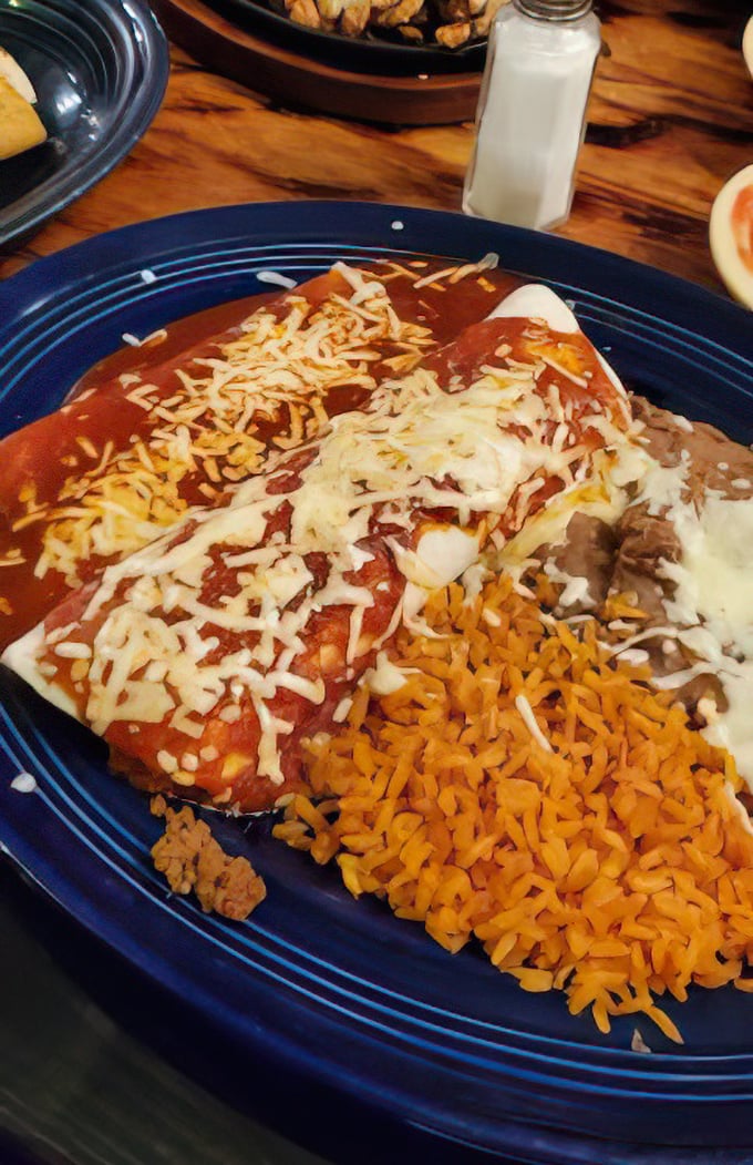 These enchiladas aren't just covered in sauce and cheese—they're tucked in under a blanket of flavor for the ultimate comfort food nap.