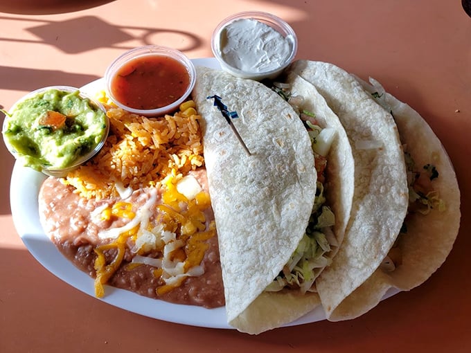 Fish tacos that bring the beach to your plate – a perfect California marriage of fresh seafood, warm tortillas, and all the fixings.