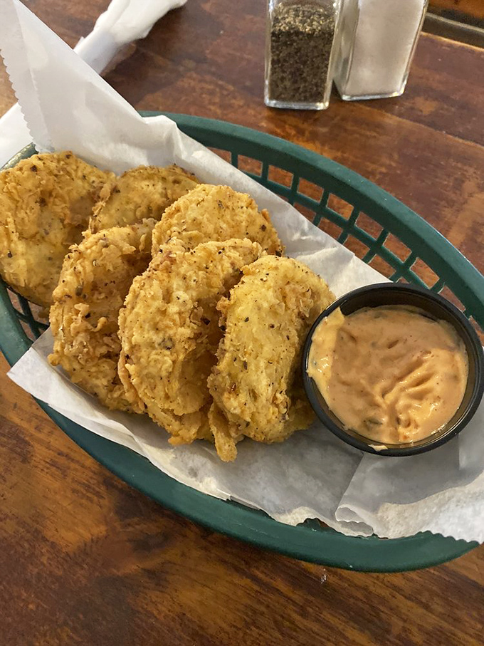 Fried green tomatoes that would make Idgie Threadgoode proud. Crispy, tangy discs of Southern heritage served with a sauce worth bottling.