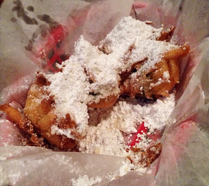 Fried Oreos dusted with powdered sugar—because sometimes dessert needs to remind you that life is short and diets are temporary.