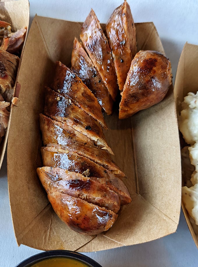 Gator sausage sliced and glistening with smoky goodness. When in Florida, eat as the Floridians do—with gusto and a side of adventure.