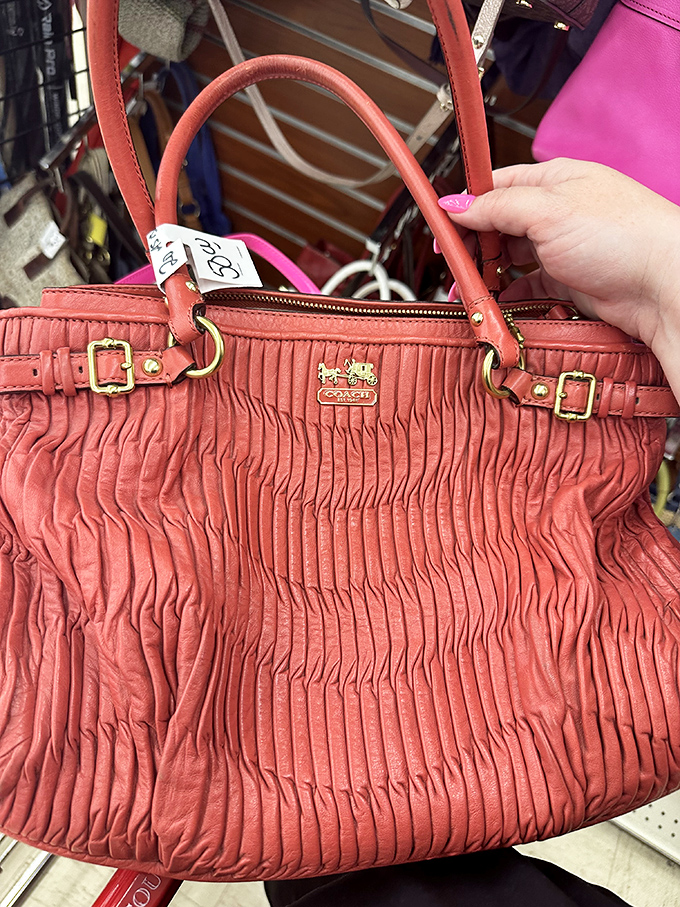Designer dreams at down-to-earth prices! This Coach bag costs less than dinner for two and tells a much better story.
