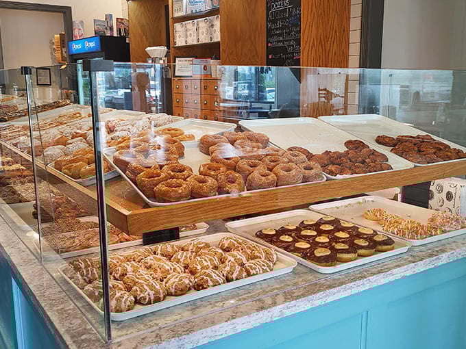The coffee station isn't merely functional—it's a temple to the sacred ritual of pairing the perfect brew with your donut of choice.