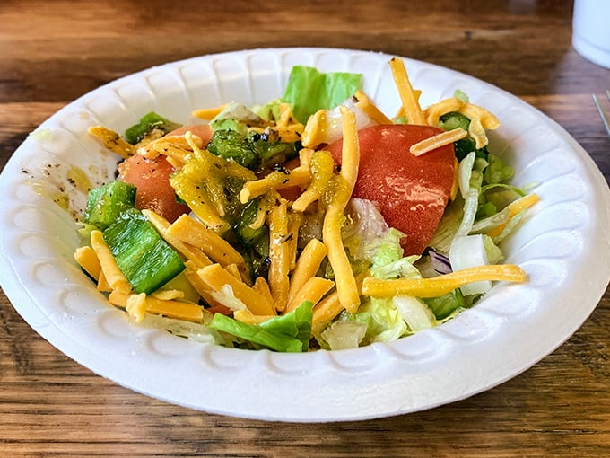 Even the salad refuses to be pretentious. Fresh ingredients simply arranged—proof that good food doesn't need to wear fancy clothes to be delicious.