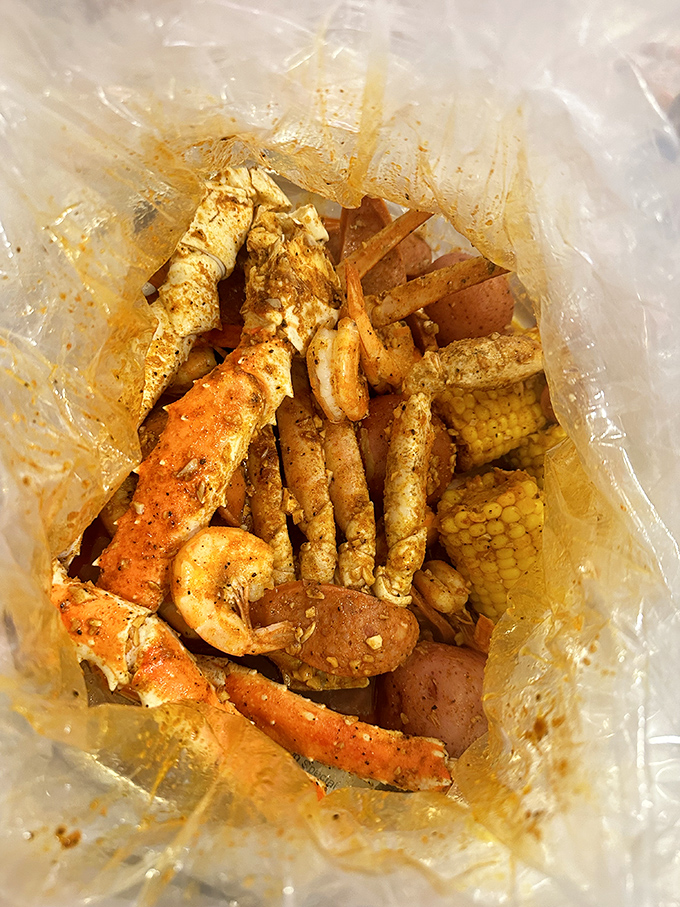 A clear bag revealing treasures more valuable than any pirate's chest. Seafood archaeology at its most rewarding.