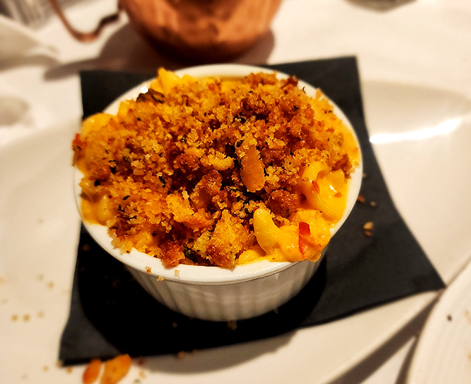 Not all heroes wear capes—some wear golden breadcrumb topping over molten cheese. This mac and cheese has solved more problems than therapy.