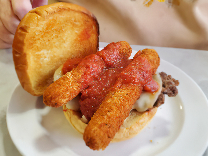 The mozzarella sticks burger—where someone dared to ask, "What if we combined two perfect foods?" and created something greater than the sum of its parts.