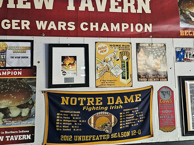 The Notre Dame banner and "Burger Wars Champion" sign tell you everything – this place has serious local cred and the trophies to prove it.