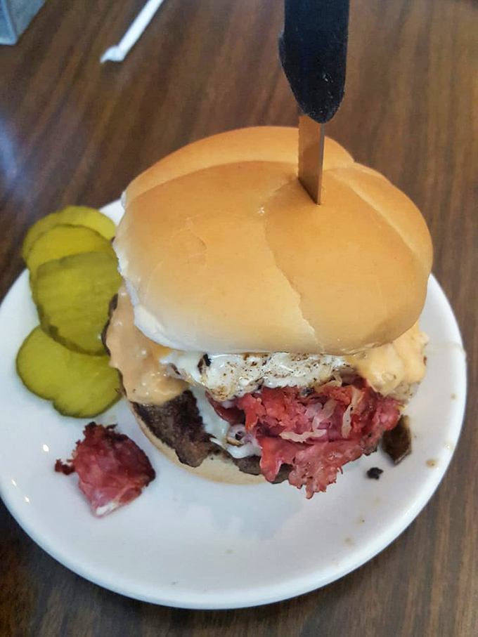 A sandwich that doesn't just satisfy hunger—it creates memories. Corned beef, Swiss, and house sauce on a fresh bun is simple perfection done right. 