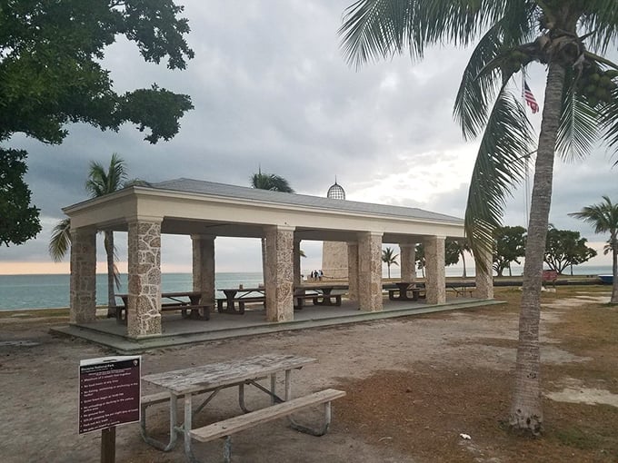 The island's picnic pavilion stands like a classical temple to outdoor dining, where even a simple sandwich tastes better with that million-dollar ocean panorama.