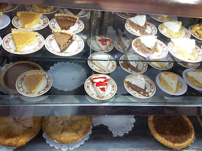 The pie case at Rose Garden is like a museum of Southern comfort—each slice a masterpiece of flaky crust and sweet filling waiting for its moment of glory.