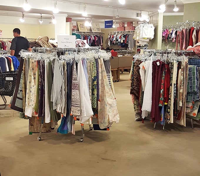 A textile treasure hunt unfolds in the linens section, where vintage patterns and practical basics share shelf space in perfect harmony.