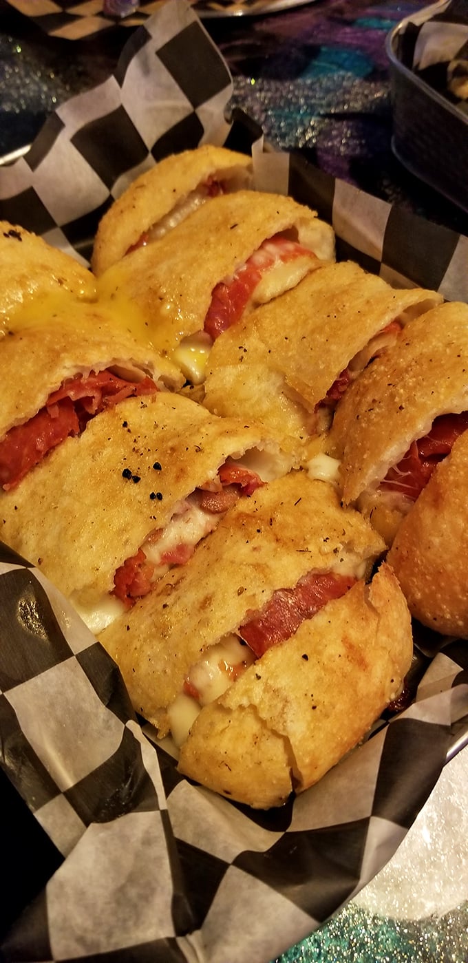 When pizza and wrap have a delicious love child. Crispy exterior giving way to melty cheese and savory fillings—handheld happiness at its finest.
