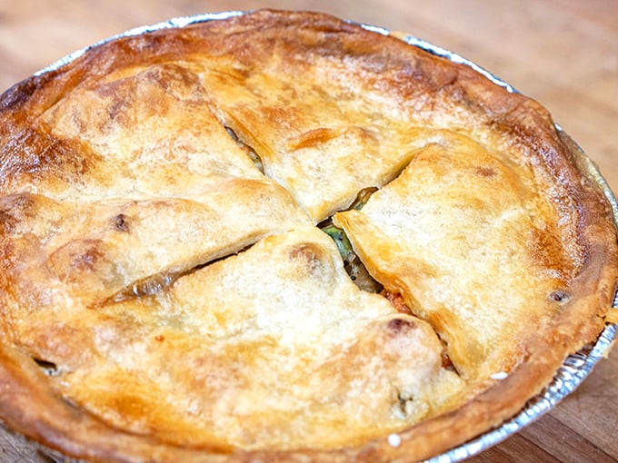 Not all heroes wear capes—some wear perfectly golden crusts. This savory pot pie promises the comfort food equivalent of a warm hug on a chilly day.