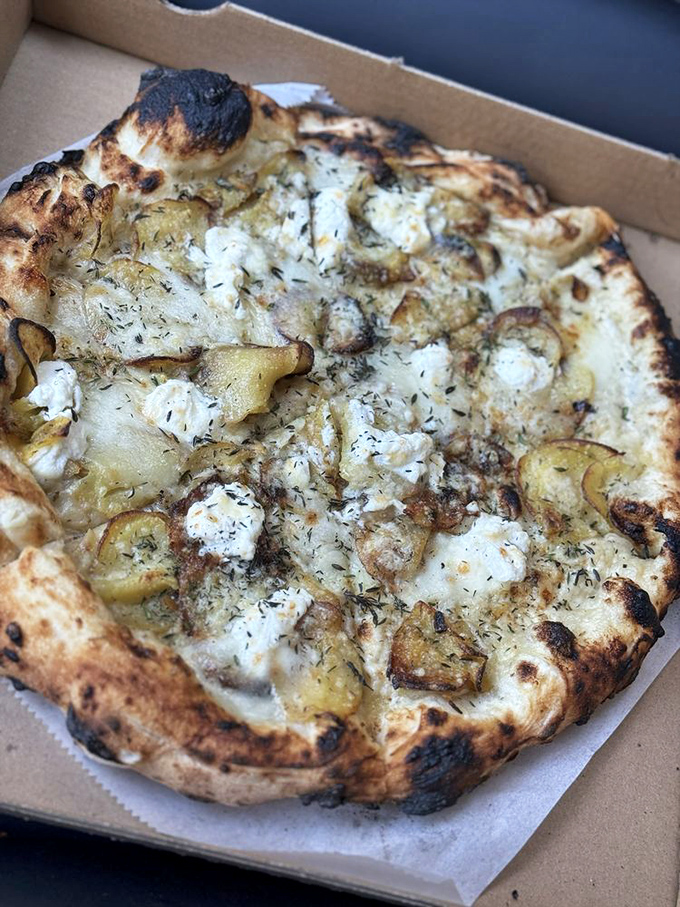 The potato pizza proves that carbs-on-carbs isn't just acceptable—it's a revelation that will haunt your dreams in the best possible way.