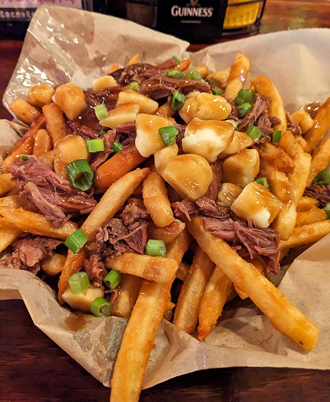 Irish-Canadian diplomacy on a plate: crispy fries, savory gravy, and cheese curds topped with tender beef. Poutine that would make both nations proud.