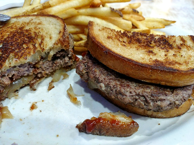 The patty melt—where burger meets grilled cheese in a beautiful union that would make cupid weep with joy.
