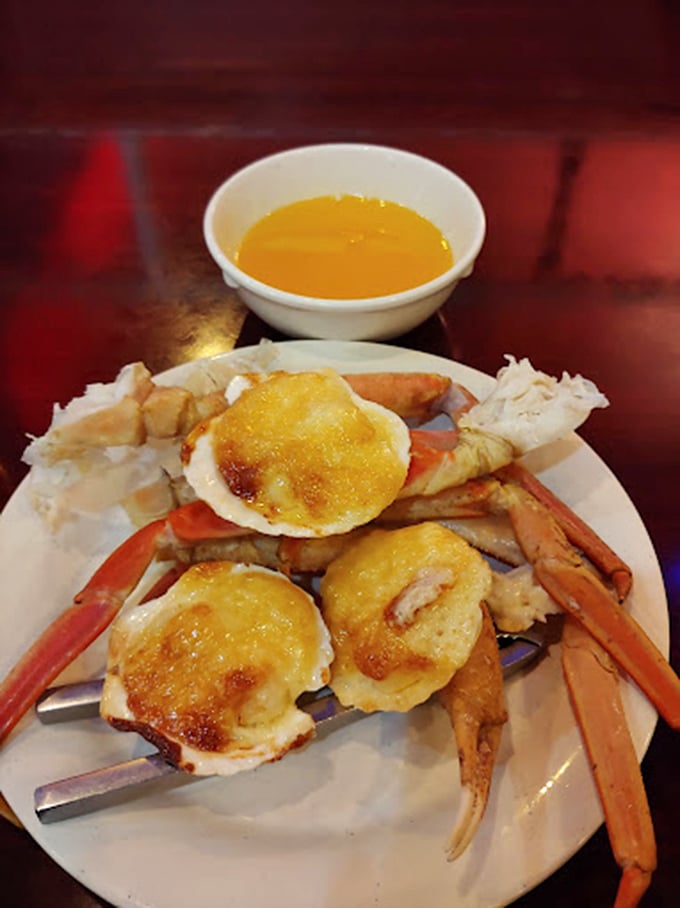 Snow crab legs and scallops broiled to golden perfection—proof that "all-you-can-eat" and "seafood worth eating" aren't mutually exclusive concepts.