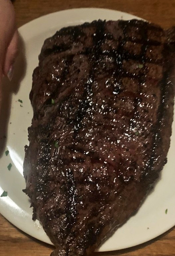 This sirloin has the kind of sear that makes other steaks envious—glistening with juices that dare you not to salivate.