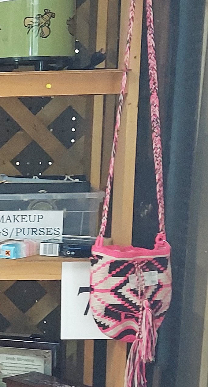 That handcrafted pink macramé bag isn't just vintage—it's the accessory your most interesting friend would spot from across the room.