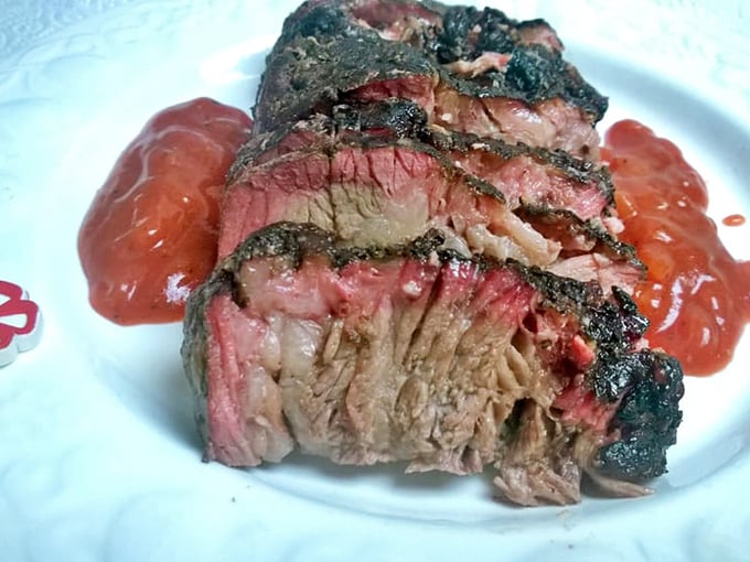 Brisket with that perfect pink smoke ring—the barbecue equivalent of finding a unicorn. Slice it thin, eat it thick.