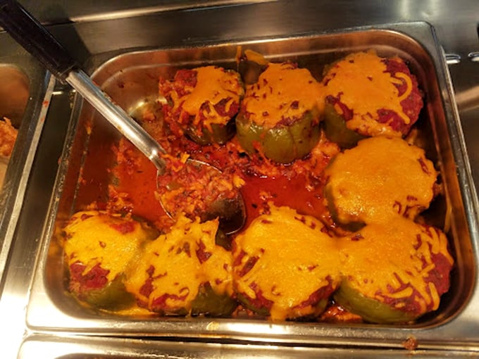 Stuffed peppers that grandmothers everywhere would approve of—cheese-topped, sauce-smothered comfort that makes vegetables feel like an indulgence rather than a duty.