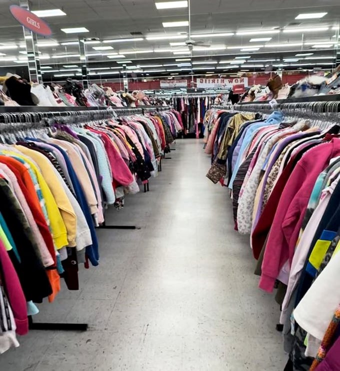 The sweater aisle: a textile time machine where every color in the crayon box has been knitted into something cozy.