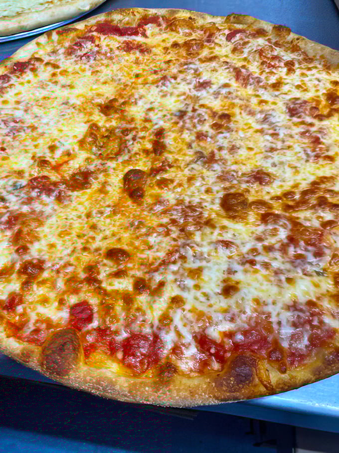 That cheese pull could win an Olympic gold medal – this pizza means serious business in the best possible way.