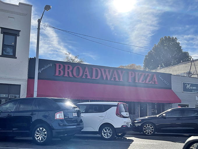 Broadway Pizza's bold red awning stands out like a beacon, guiding Memphis pizza lovers to flavor town.