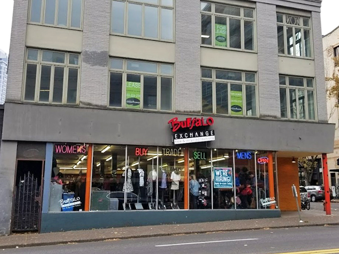 Buffalo Exchange's storefront glows with neon promise—a curated collection of fashion's greatest hits awaiting new performers.