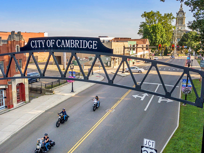 Cambridge welcomes travelers with an iconic bridge spanning its main thoroughfare. Not just a sign—it's a gateway to small-town charm.