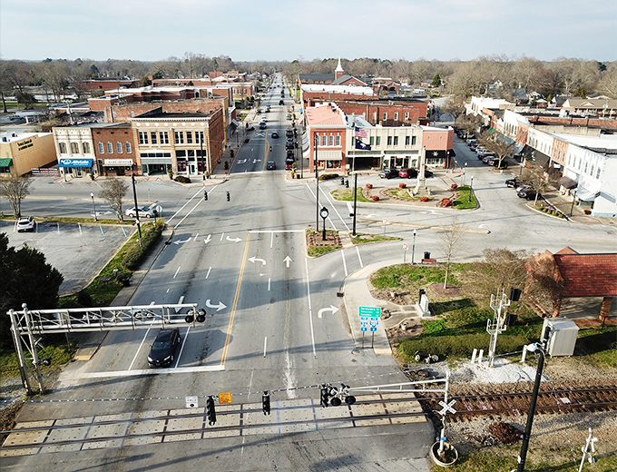 Clinton's downtown intersection proves that four-way stops can lead to affordable living in all directions.