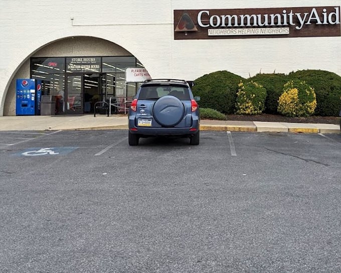 Community Aid's distinctive arched entrance isn't just architectural flair—it's a gateway to guilt-free retail therapy.