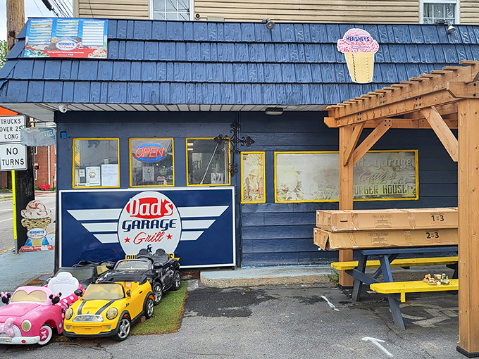 Dad's Garage Grill embraces its playful theme with toy cars parked outside – dinner and entertainment in one stop!