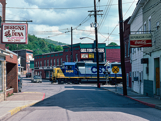 A train rumbles through downtown Lonaconing, connecting past and present. Some things change, but the 3 freight is eternal.