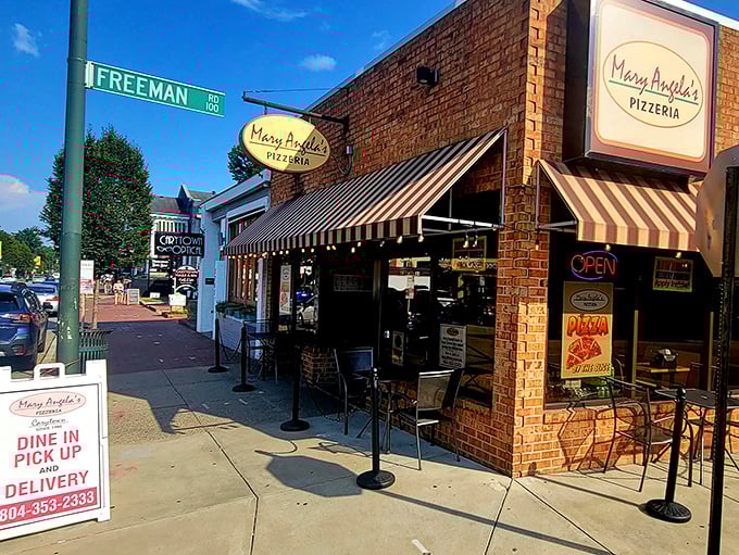 Mary Angela's charming brick storefront with classic striped awnings beckons pizza lovers like a siren song. Resistance is futile!