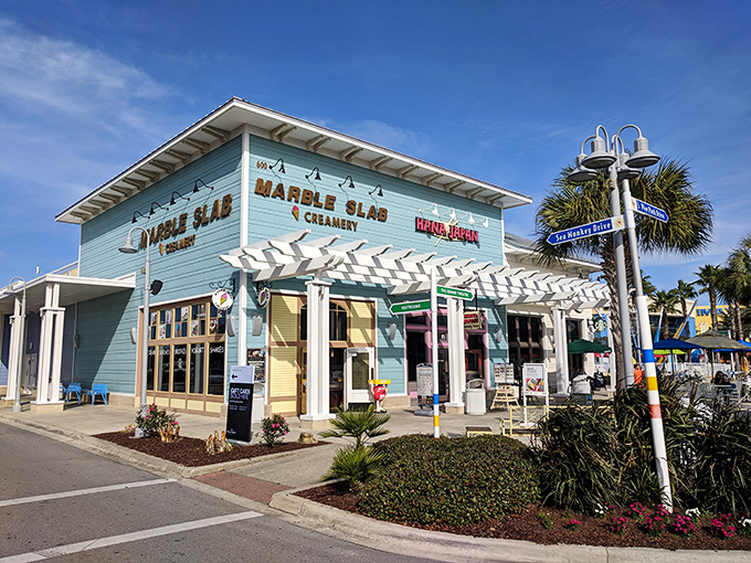 Marble Slab Creamery's beachy blue building promises sweet relief from Florida's heat – calories don't count on vacation!