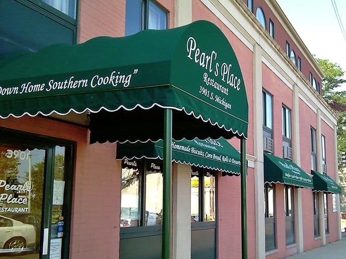 Pearl's Place's elegant green awnings hint at the Southern sophistication within. This isn't just soul food—it's food with soul.