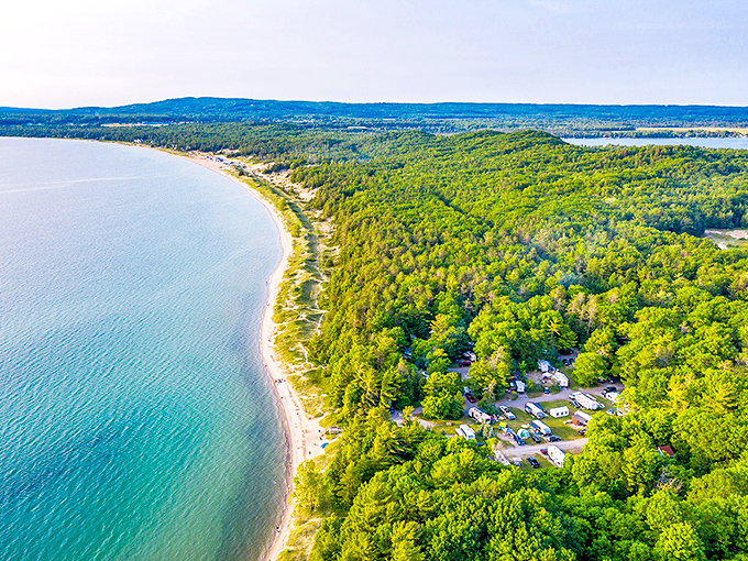 Petoskey: Sand dunes meeting crystal waters – Mother Nature's version of a perfect first date. I'm ready to commit to this view.