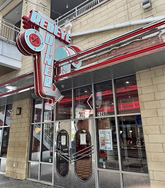 RedEye Diner's retro-modern sign pops against the urban landscape – a beacon for the breakfast-obsessed in Charlotte.