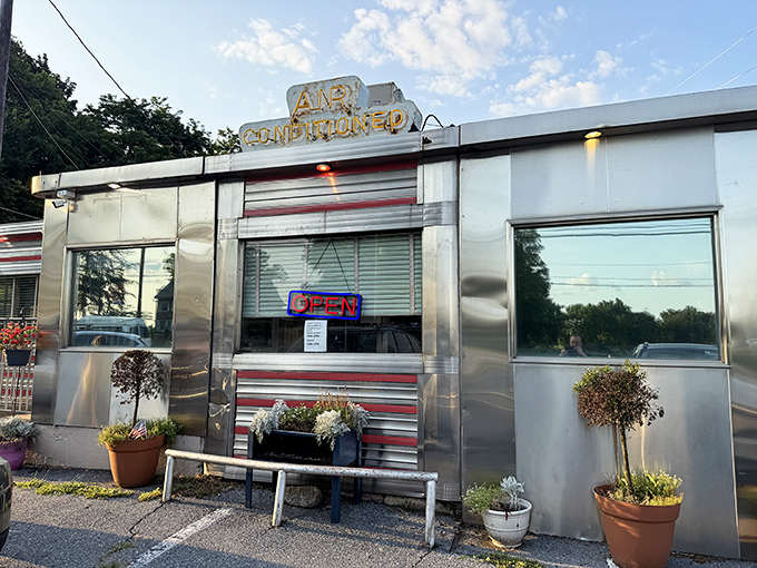 Route 30 Diner's stainless steel exterior gleams like a beacon to road-weary travelers, promising refuge in a world of fast food mediocrity.