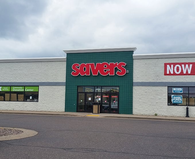 Savers' distinctive green facade stands out like a dollar bill in a sea of credit cards—promising value inside.