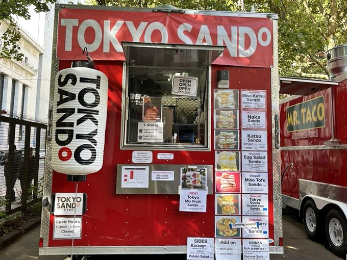 Tokyo Sando's fire-engine red food cart proves big flavors come in small packages—Japanese sandwich magic in portable form.