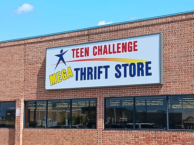 The bold red and yellow signage promises exactly what you'll find inside: mega deals on pre-loved treasures.