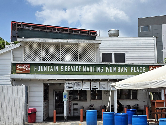 That vintage "Fountain Service" sign isn't just nostalgic decoration – it's a portal to Austin's burger history.