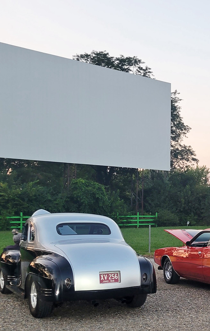 That classic car knows the best spot at Holiday Auto Theatre. Some traditions are worth preserving—and improving with cupholders!