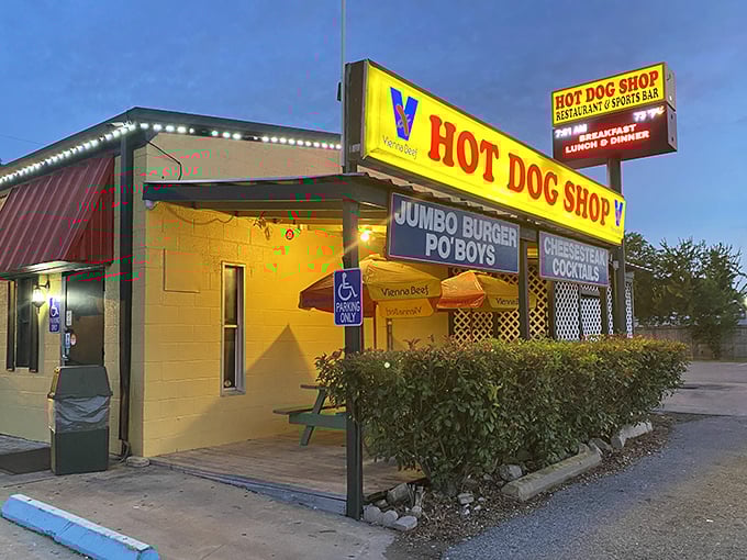 When the sun sets, Hot Dog Shop's illuminated sign guides hungry night owls to hot dog heaven in the heart of Houston.