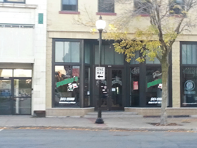 Downtown Stevens Point's unassuming pizza hero doesn't need fancy décor – just look through those windows at the pizza magic happening inside.