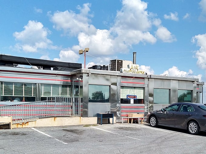 When sunlight hits the chrome exterior of this roadside classic, it's not just a diner—it's a silver monument to America's love affair with honest food and endless coffee.
